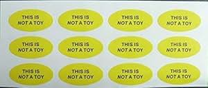 12 Warning Stickers, This is NOT A Toy', 12 40x20mm Oval Size Self ...